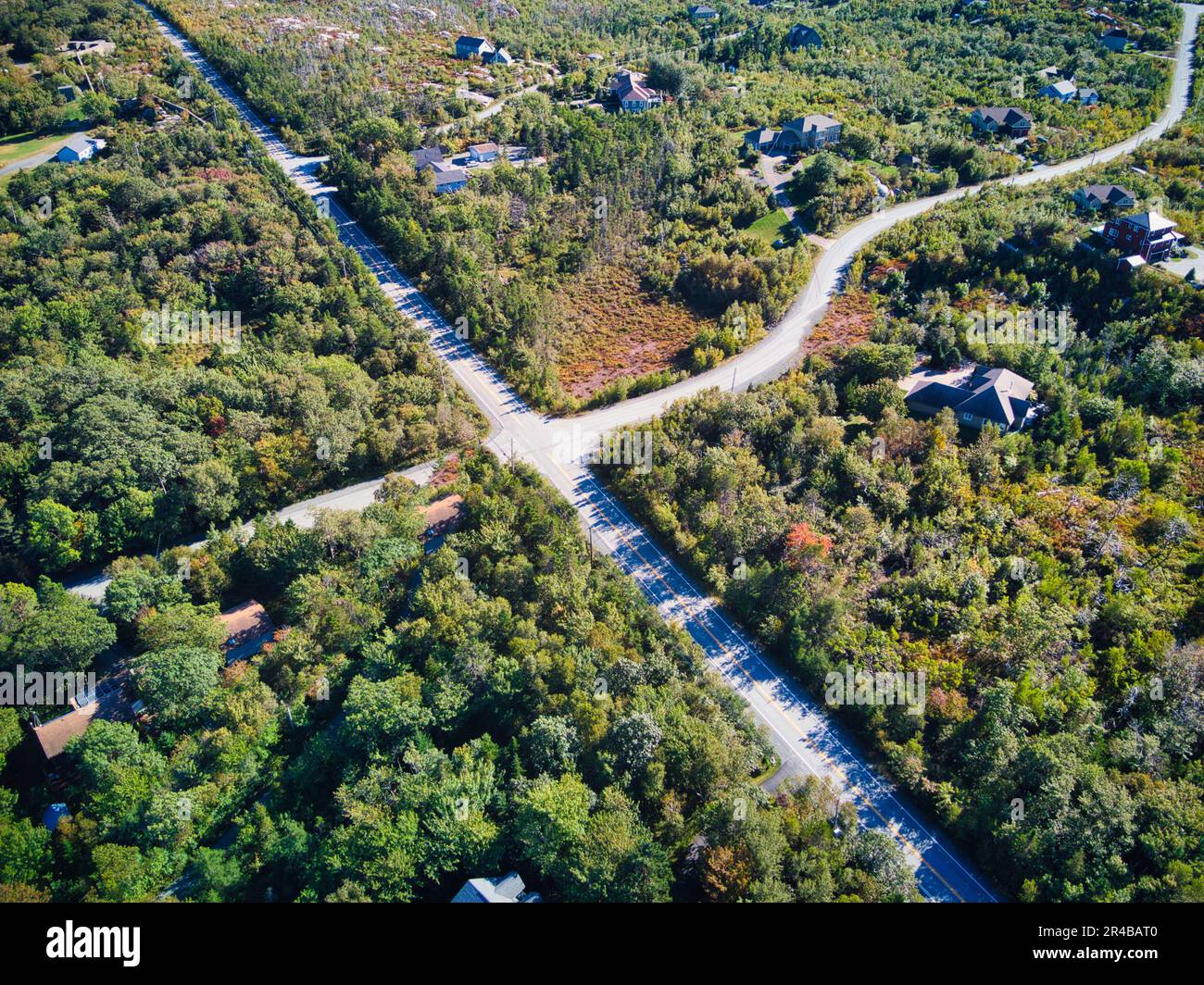 An aerial shot of a picturesque residential neighbourhood, with a ...