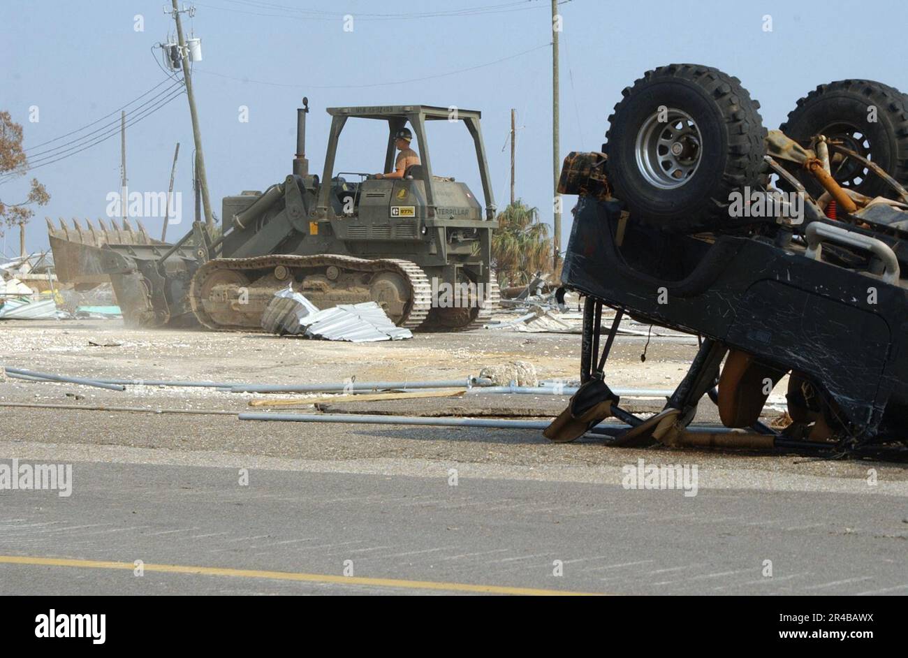 US Navy A U.S. Navy equipment operator assigned to Naval Mobile ...