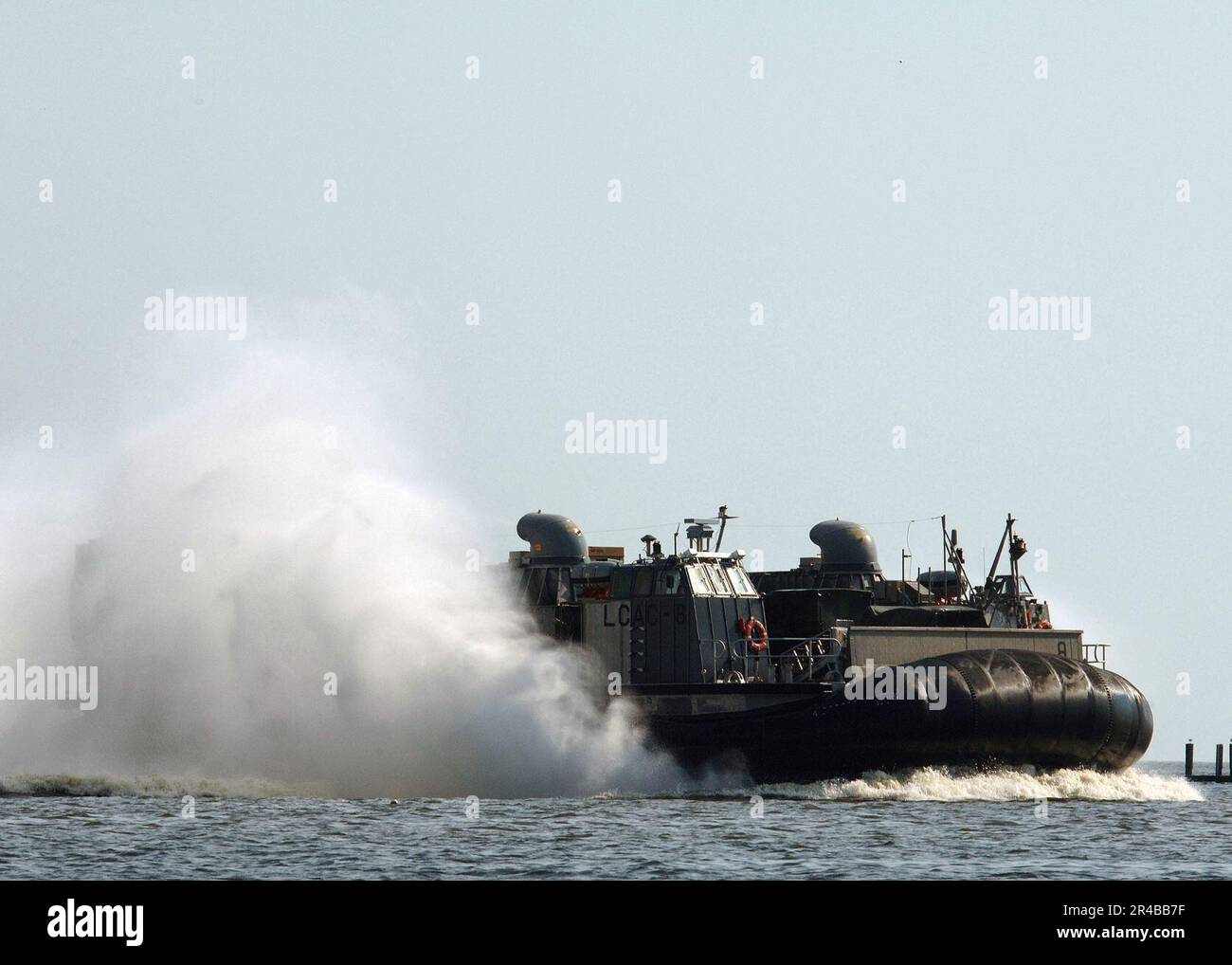 US Navy A U.S. Navy Landing Craft, Air Cushion (LCAC) approaches a ...