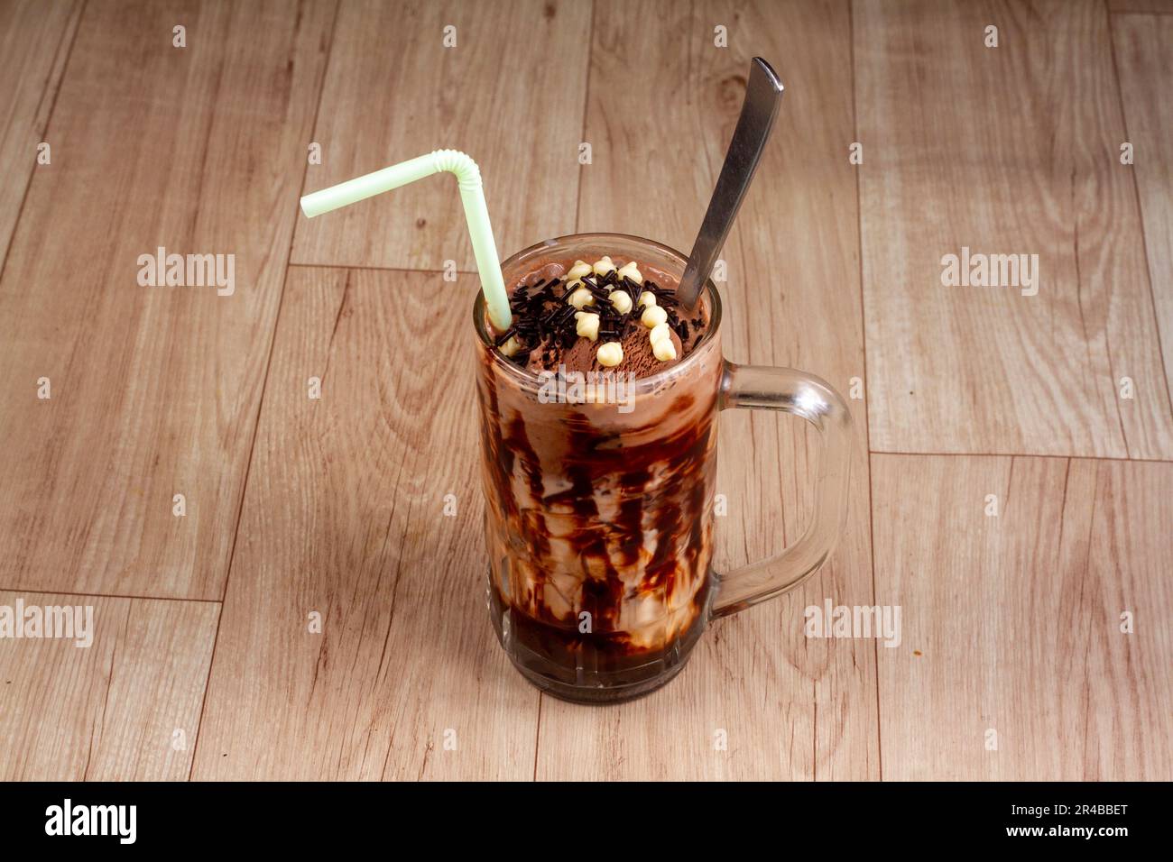 chill Chocolate Falooda in glass on wooden background Stock Photo - Alamy