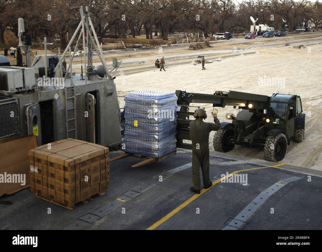 US Navy A crew member aboard a U.S. Navy Landing Craft, Air Cushion ...