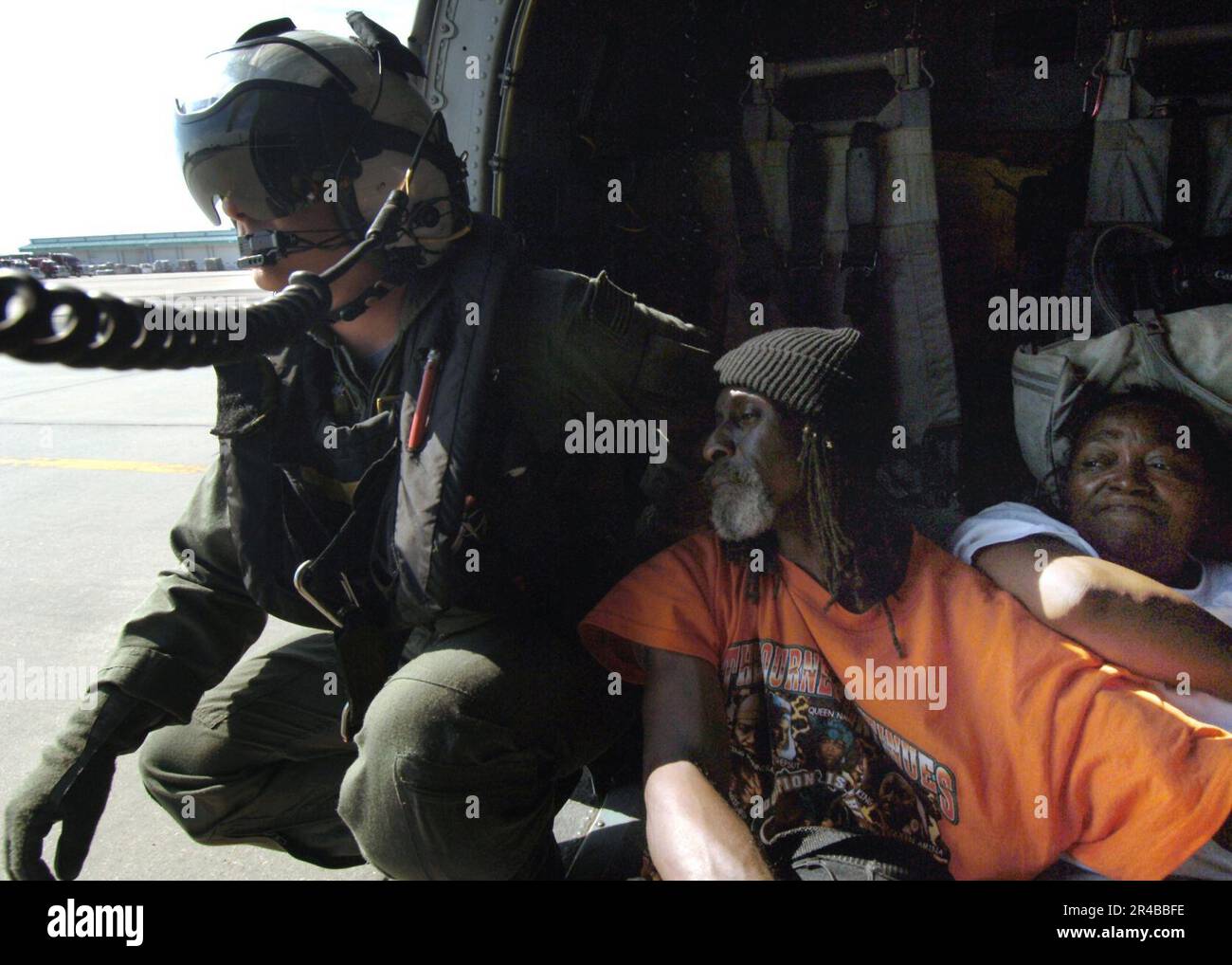 US Navy U.S. Navy Aviation Warfare Systems Operator 2nd Class looks out ...