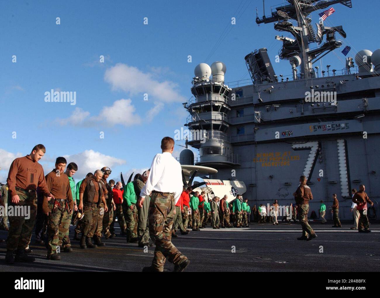 US Navy Sailors participate in a Foreign Object Debris (FOD) walk down ...