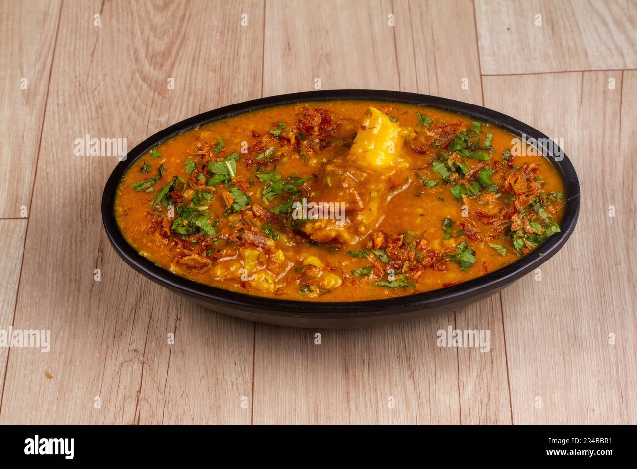 mutton khichda or Haleem in bowl on wooden background. indian food ...
