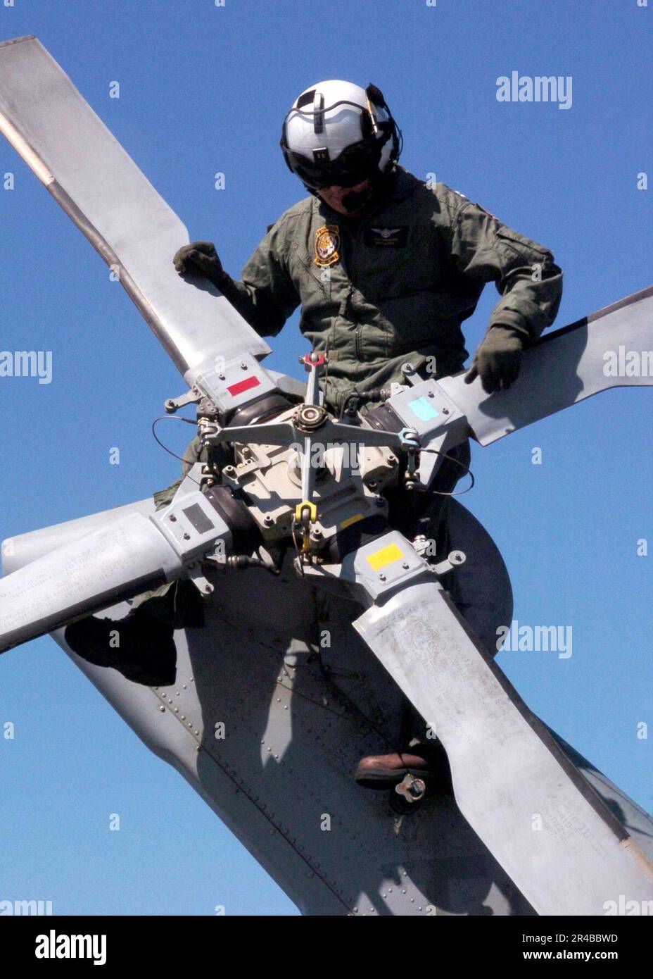 US Navy U.S. Navy Lt. checks the tail rotor of his SH-60F Seahawk ...