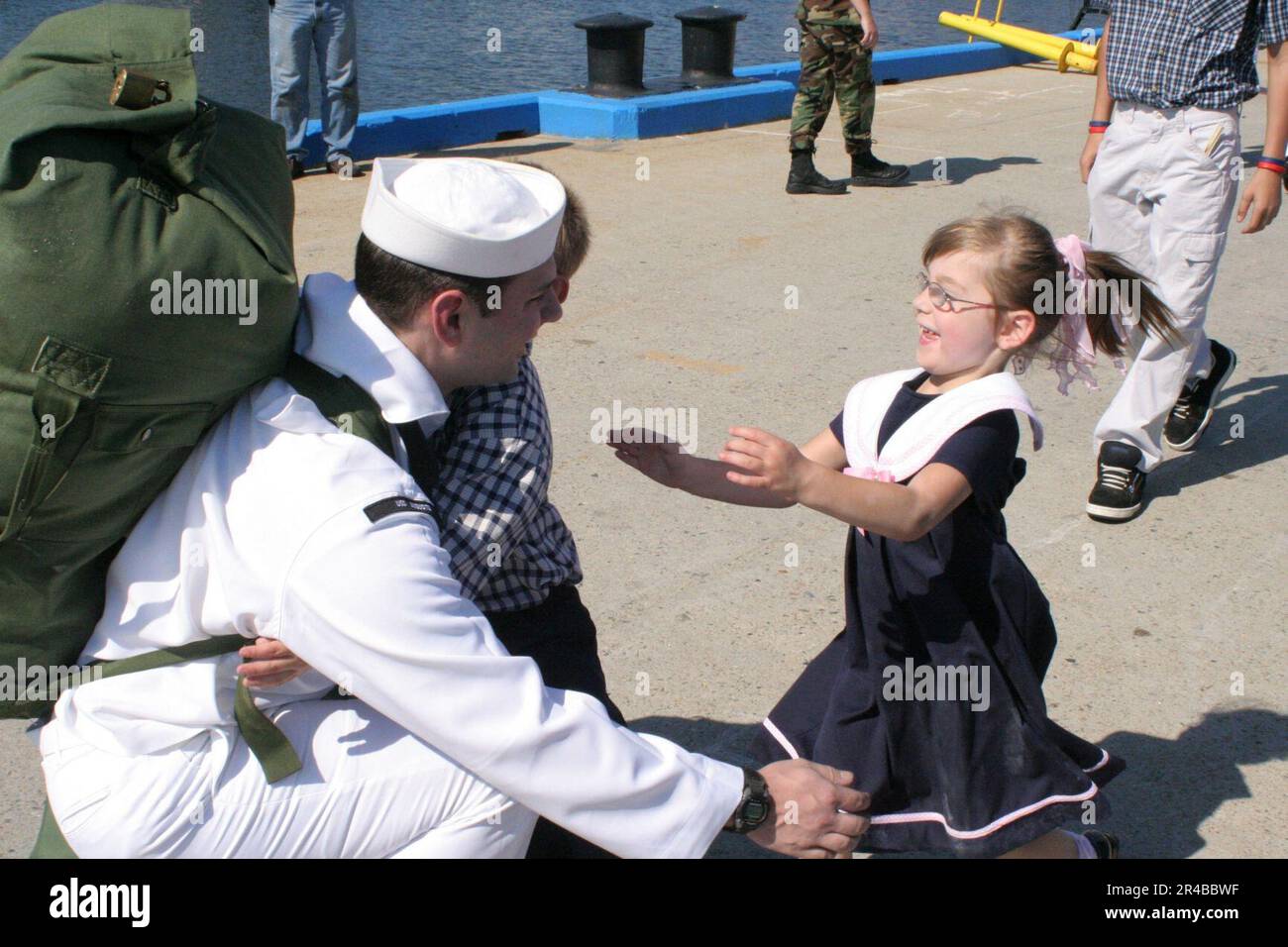 US Navy A Sailor assigned to the Los Angeles-class attack submarine USS ...
