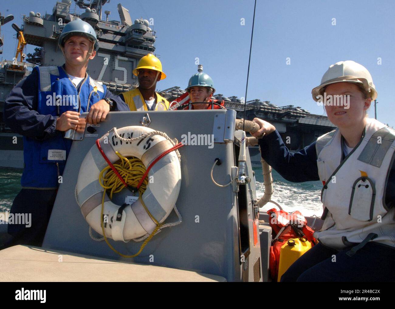 US Navy Deck Department Sailors navigate a Rigid Hull Inflatable Boat ...
