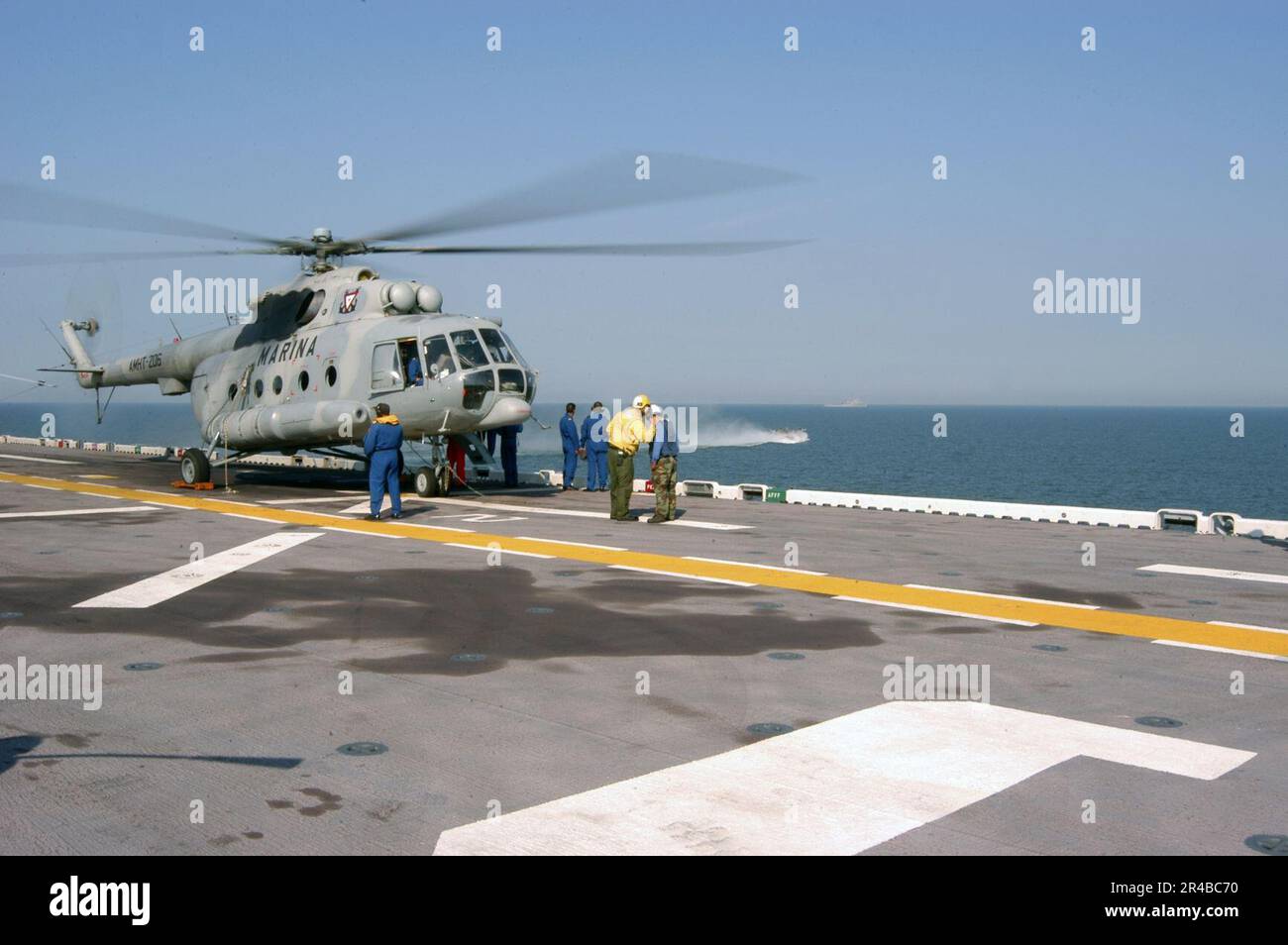 US Navy A Mexican Navy Mi-8 helicopter stands by for passengers on the flight deck aboard the ...