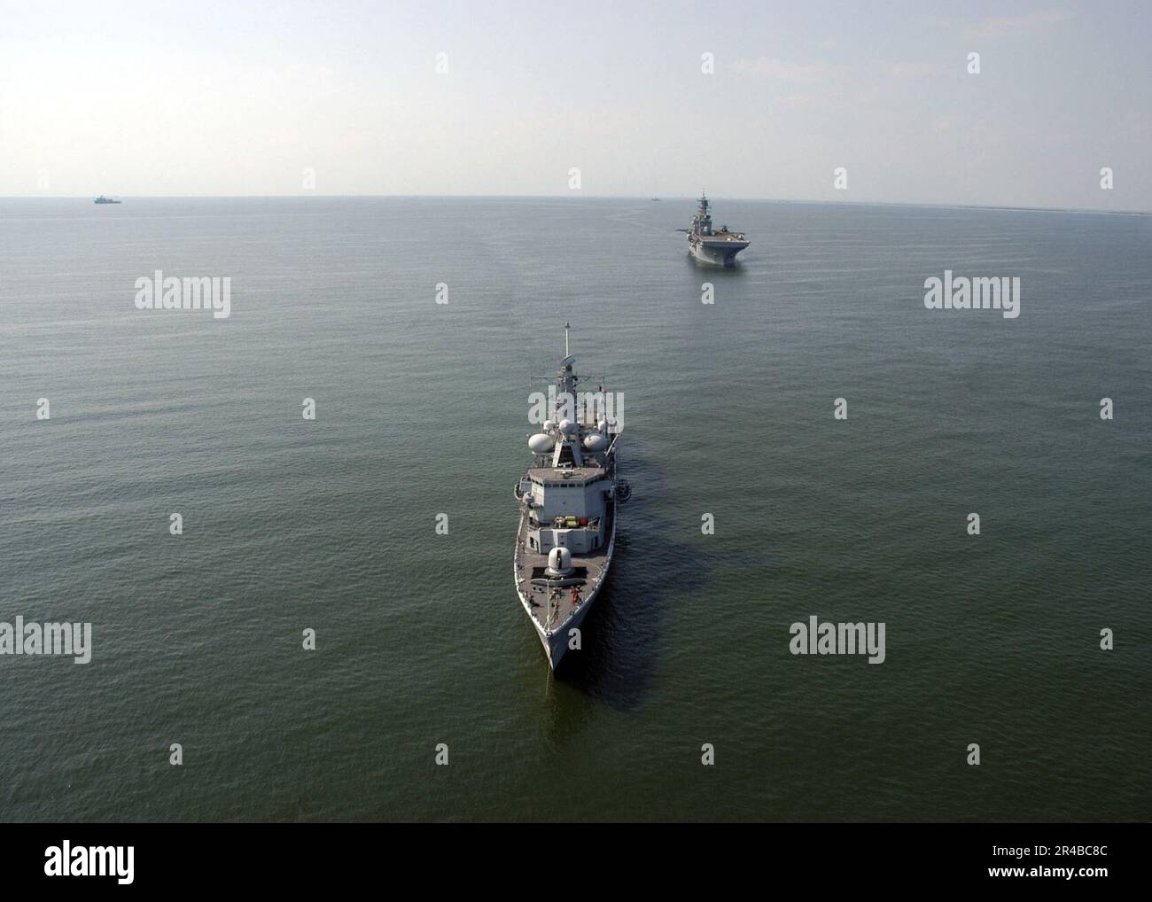 US Navy The amphibious assault ship USS Bataan (LHD 5), background ...