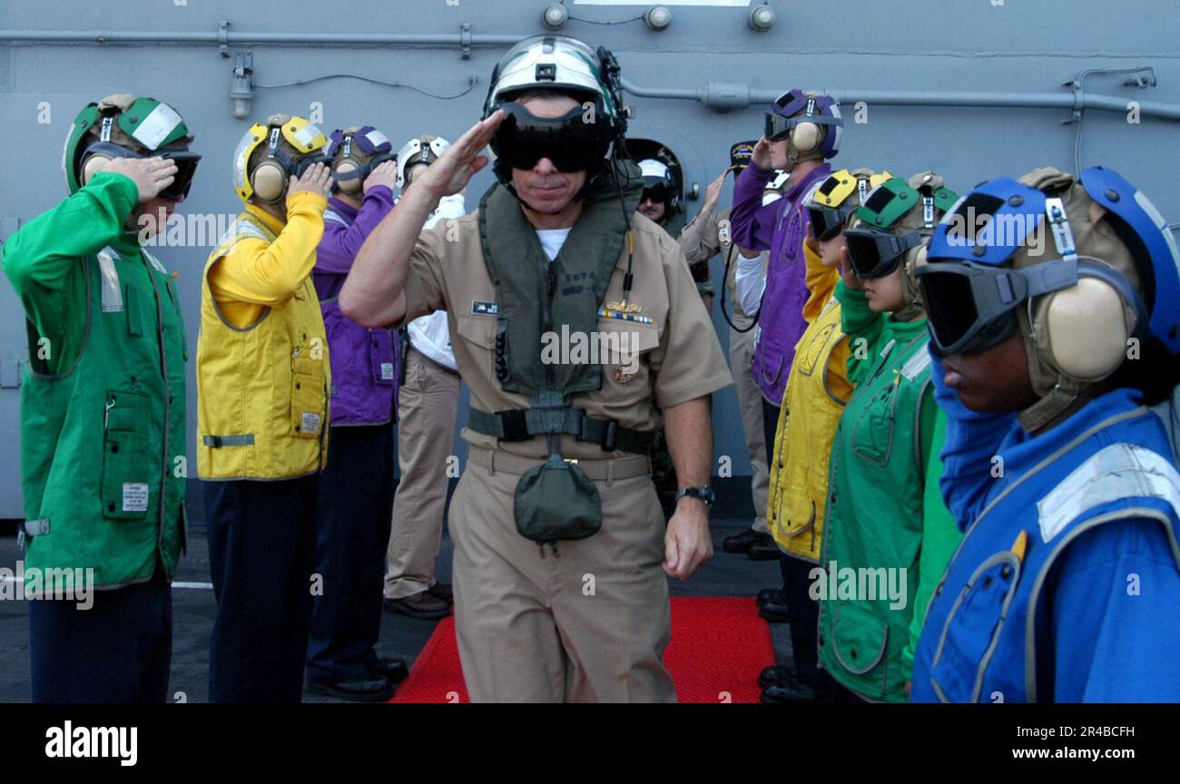 US Navy Chief of Naval Operations Adm. Mike Mullen salutes rainbow ...