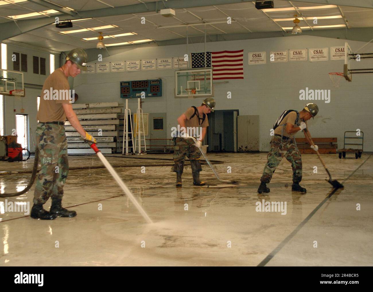 US Navy U.S. Navy Seabees, assigned to Naval Mobile Construction Battalion Four (NMCB-4), remove ...