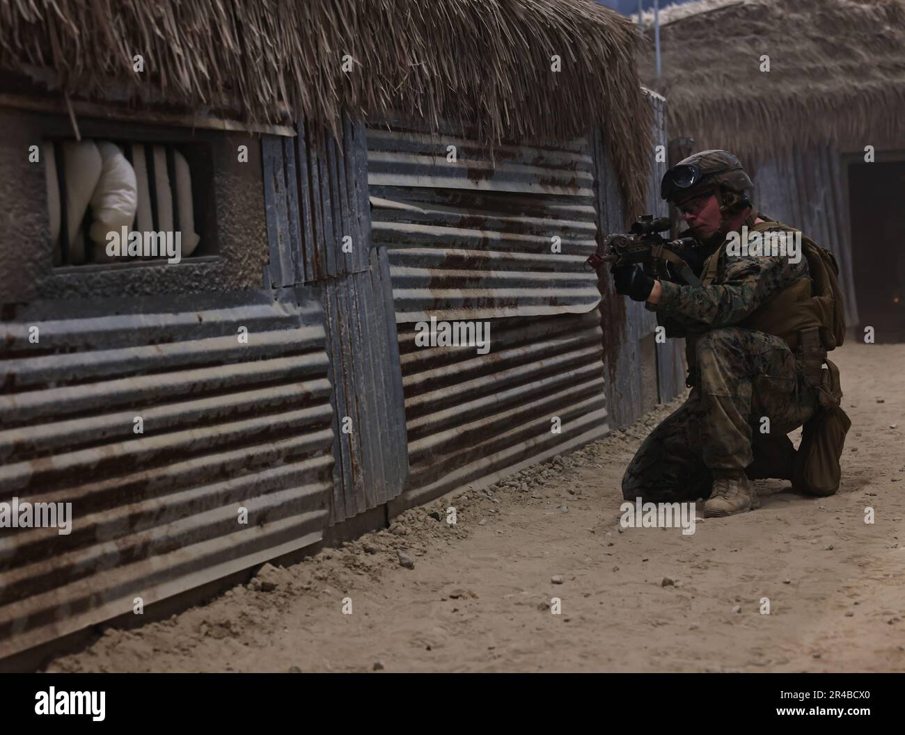 A U.S. Marine with India company, 3rd Battalion, 2nd Marines, posts a ...