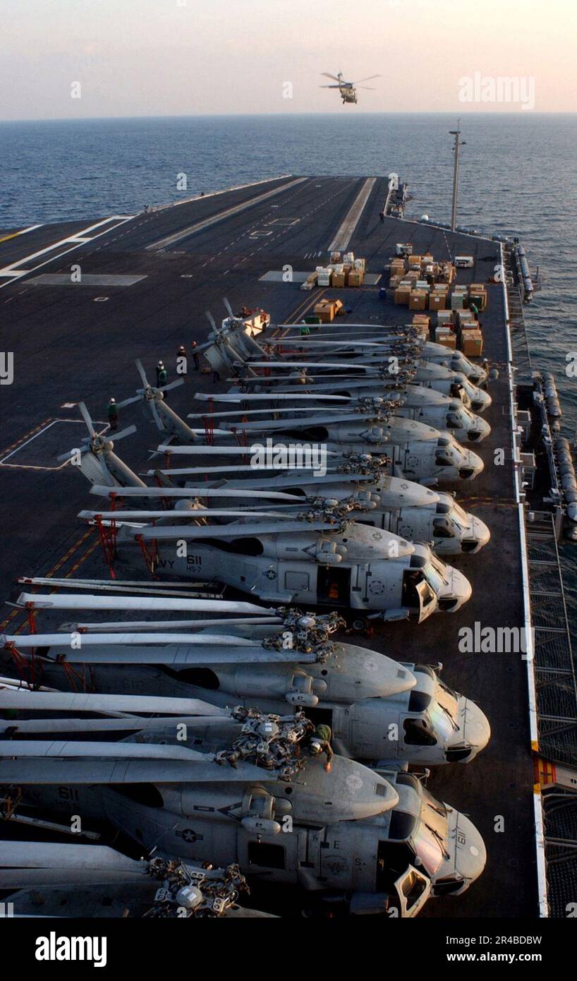 US Navy SH-60 Seahawk helicopters sit on the flight deck aboard the ...