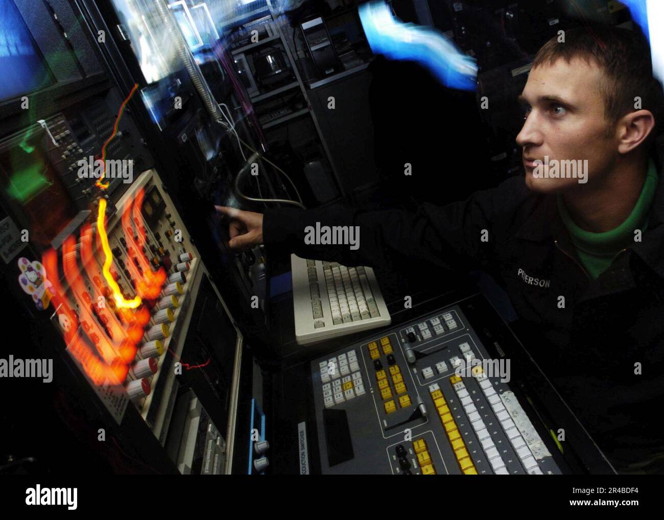 US Navy Photographer's Mate 2nd Class stands SITE TV watch in the ...