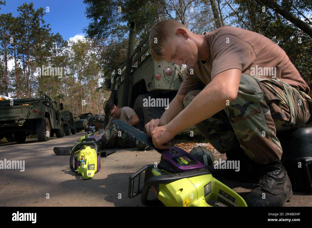 US Navy U.S. Navy Builder 3rd Class assigned to Naval Mobile ...