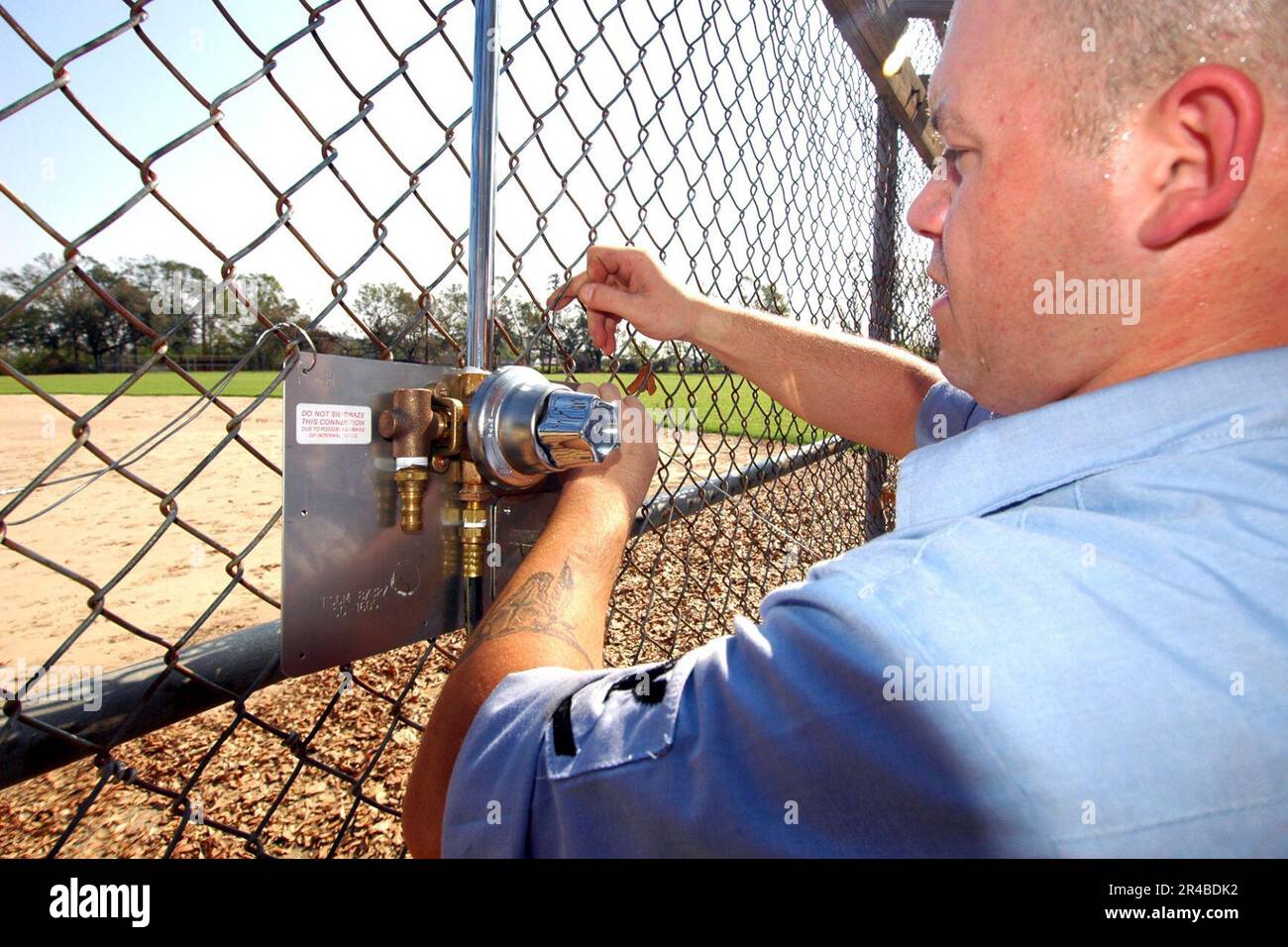 US Navy Hull Technician 3rd Class assigned to the amphibious assault ...