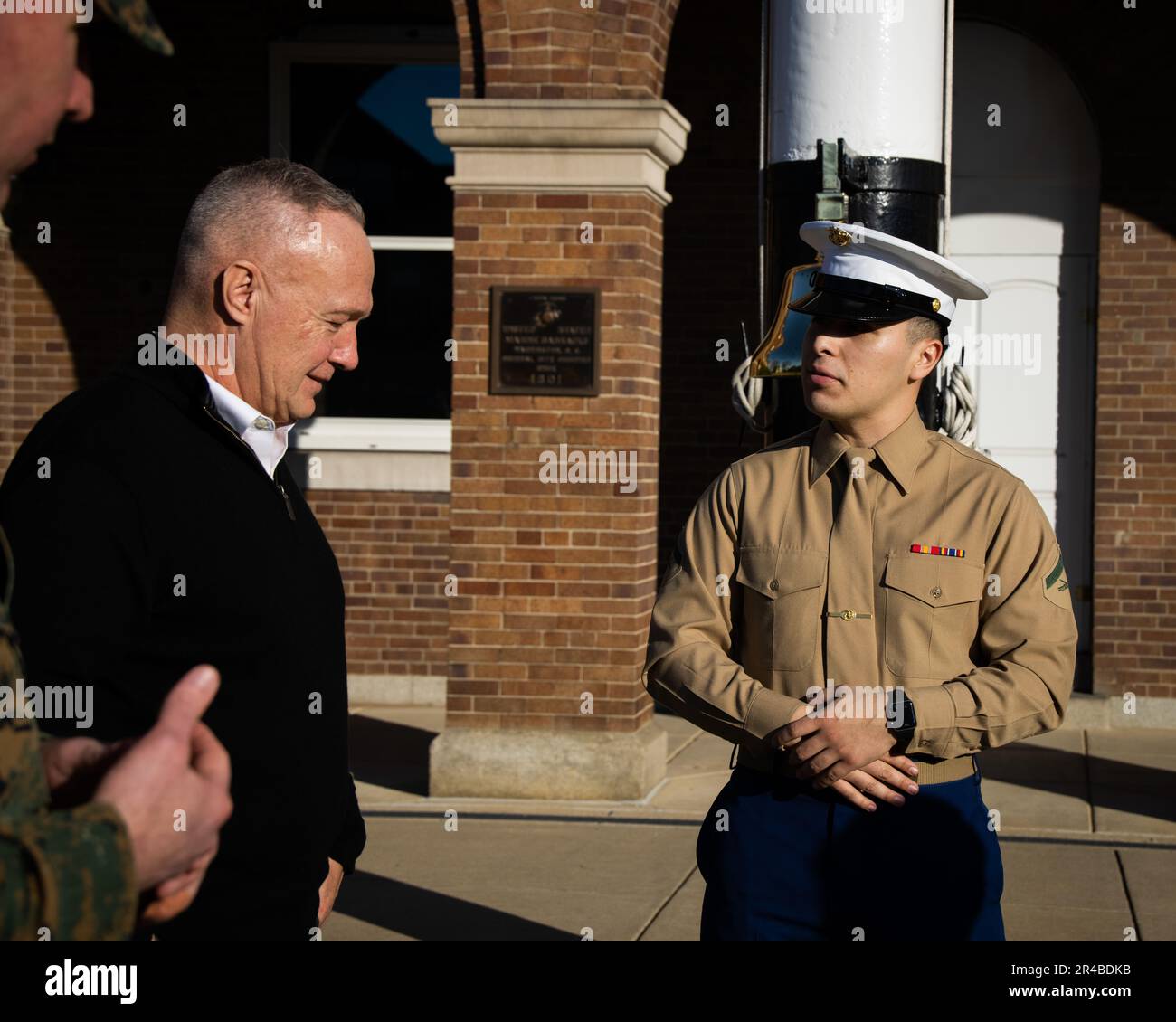Lance Cpl. Albert A. Diaz, mascot handler, right, and retired U.S ...