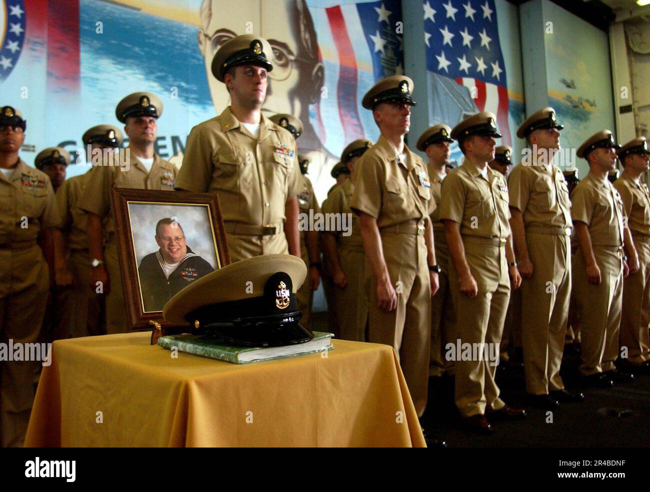 US Navy A memorial for the late Chief Damage Controlman sits next to ...