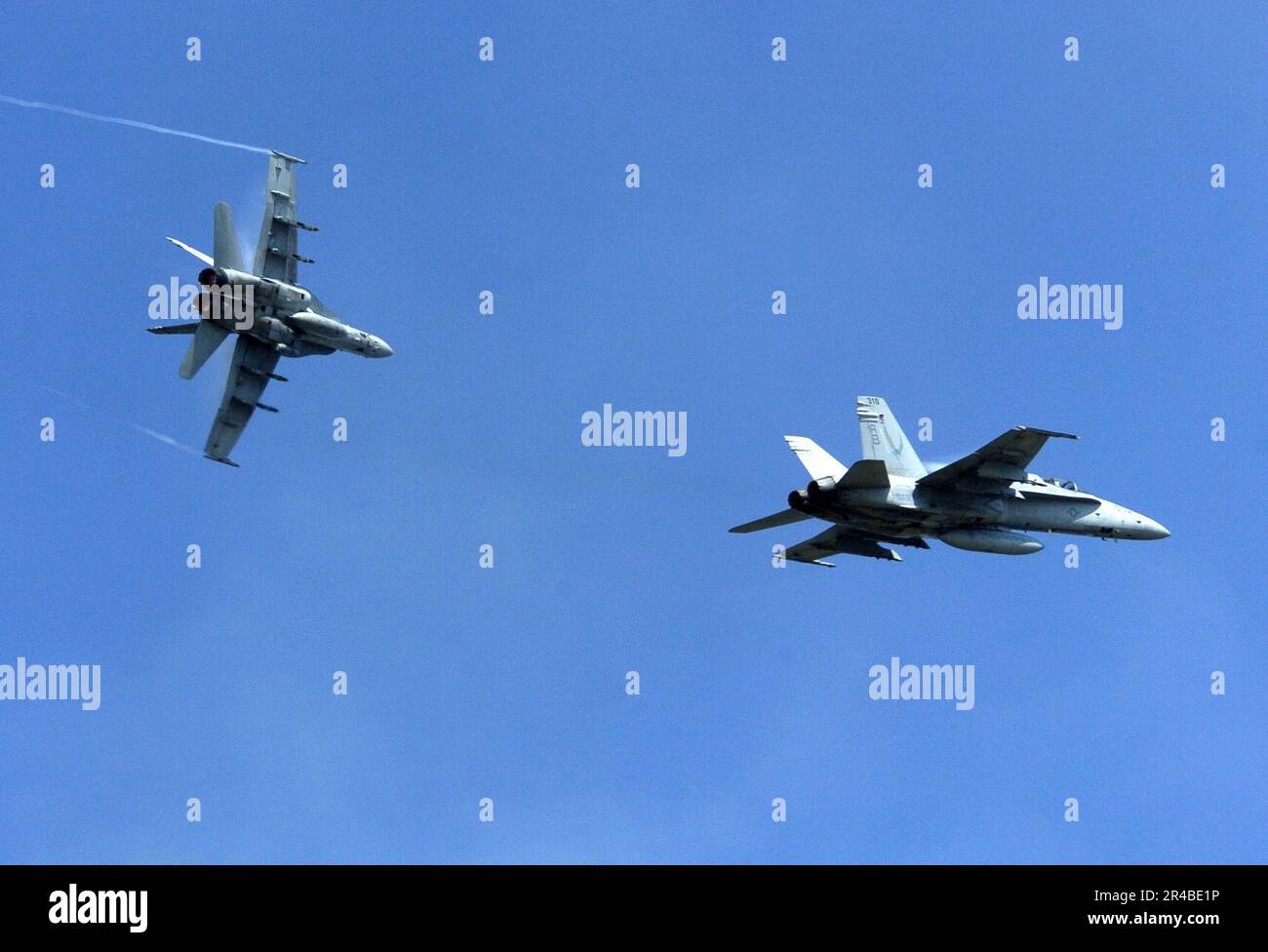 US Navy Two F-A-18C Hornets perform a carrier break maneuver Stock ...