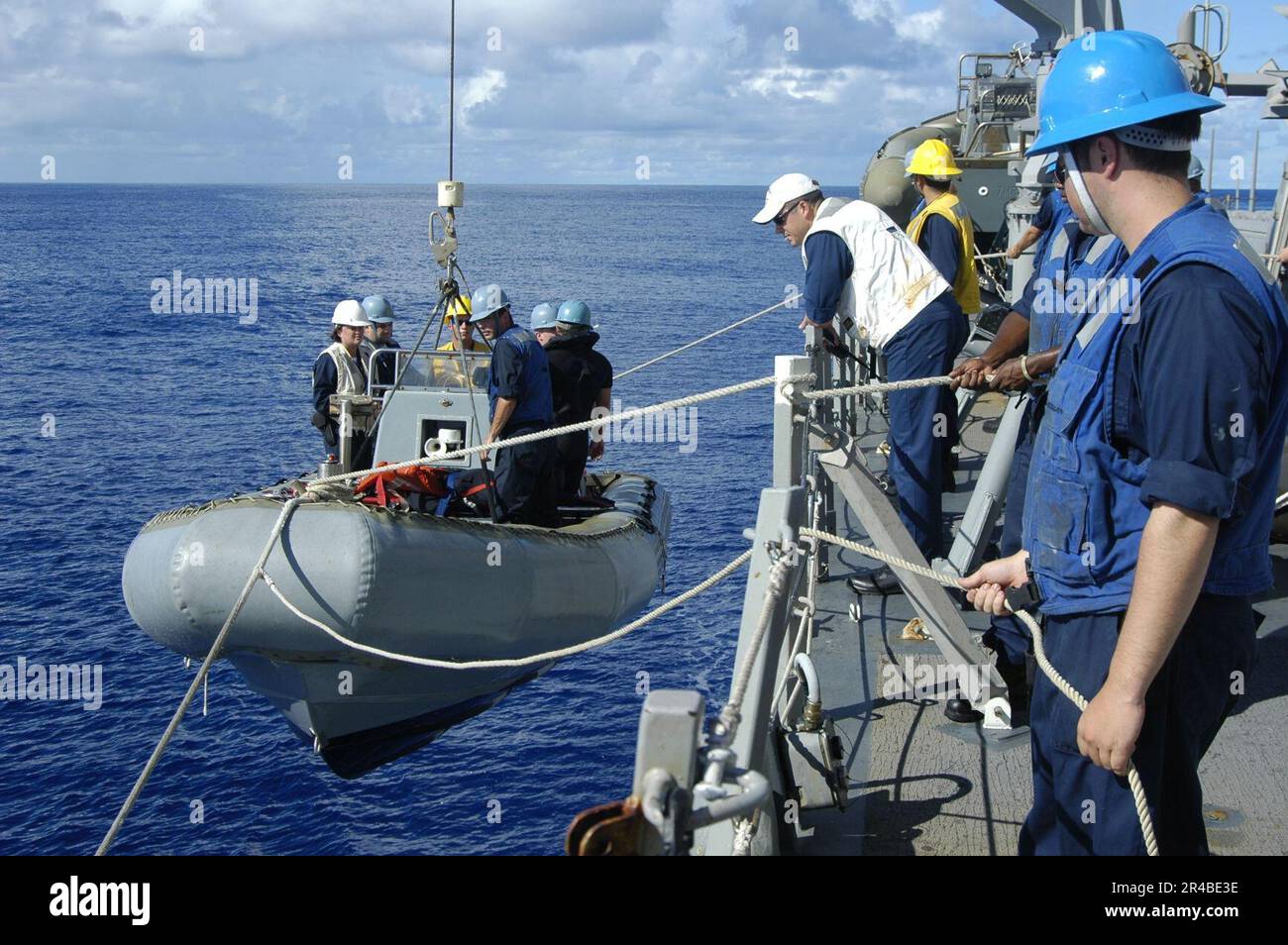 US Navy Deck department Sailors hold all lines steady as a Rigid Hull ...
