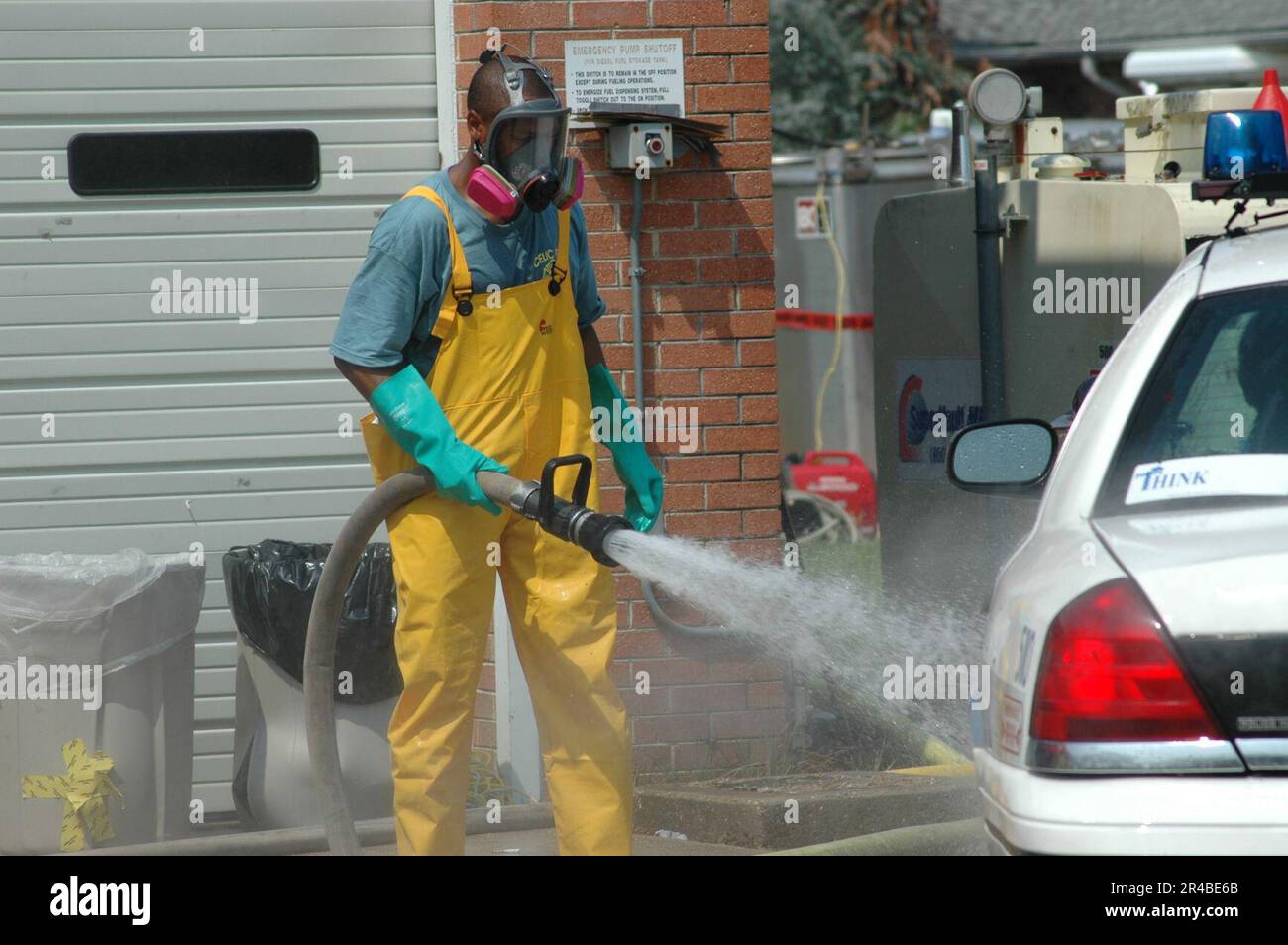 US Navy the New York Fire Department, uses a fire hose to clean tires ...