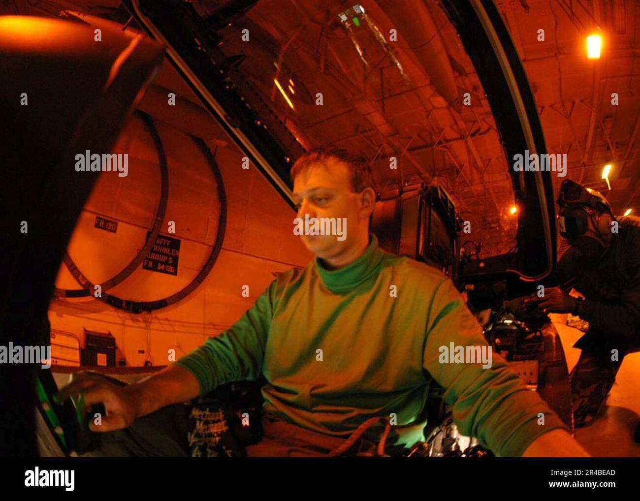 US Navy Aviation Technician 2nd class runs radar checks on an F-A-18 ...