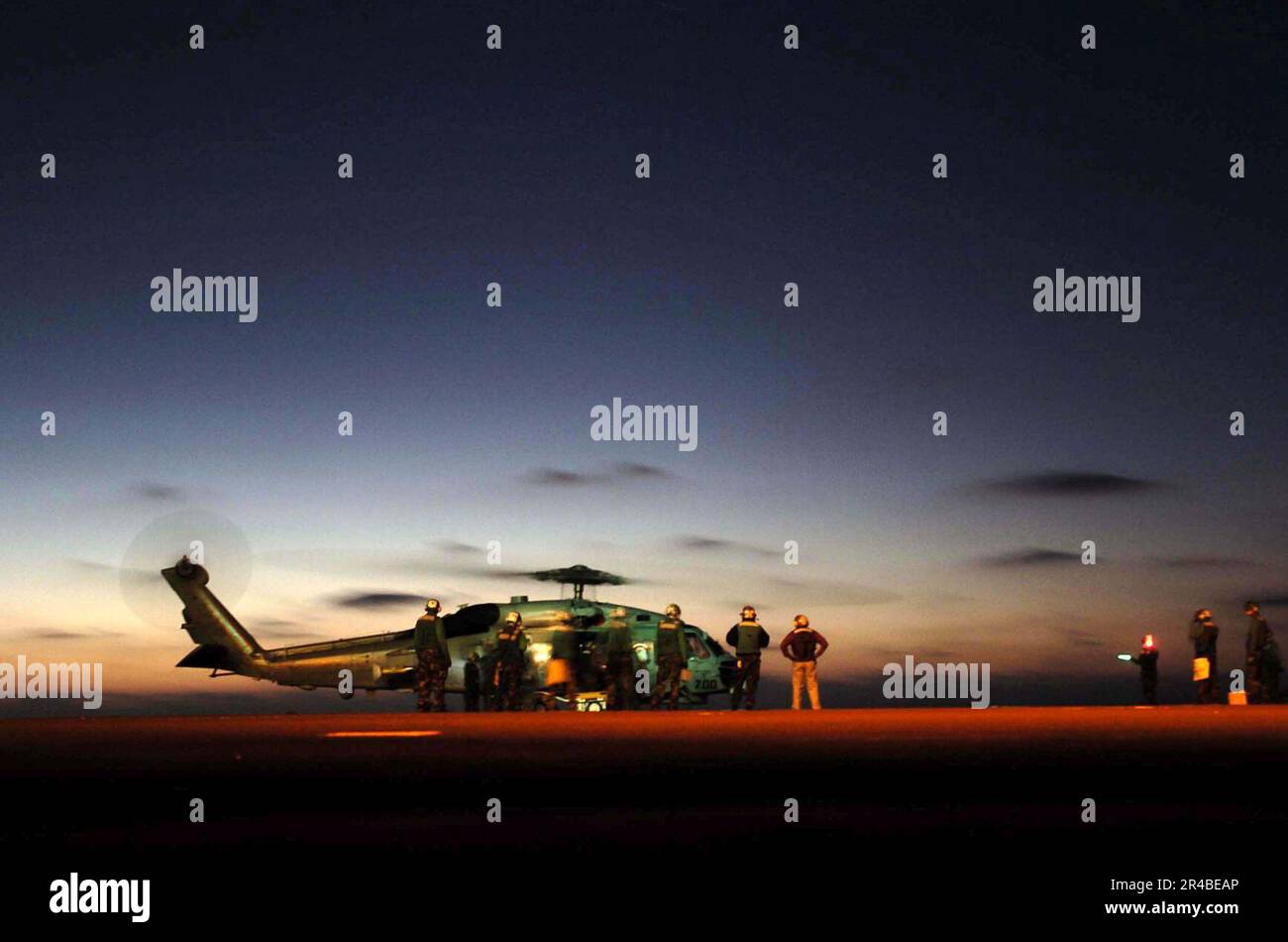 US Navy An SH-60B Seahawk refuels during plane guard duties aboard the ...