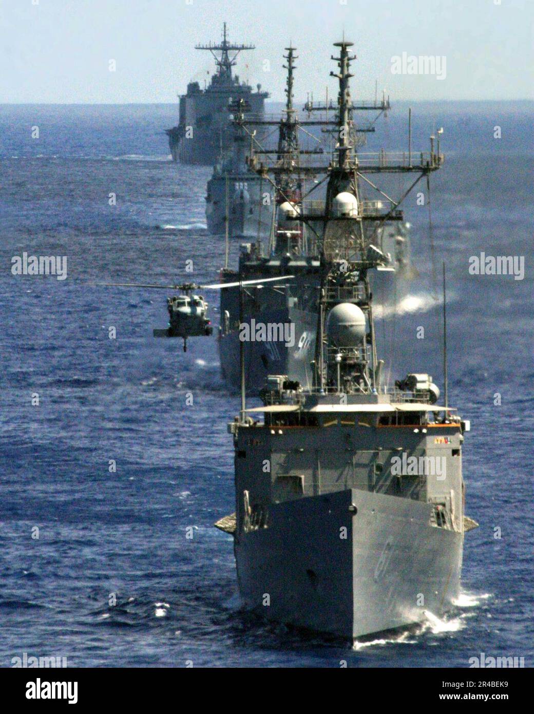 US Navy A SH-60 Seahawk helicopter prepares to land on the flight deck ...