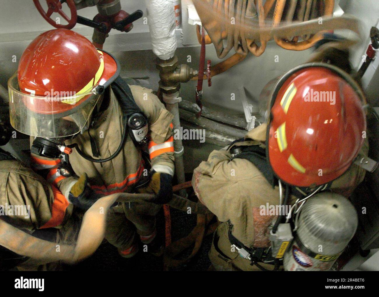 US Navy Damage Control Fireman and Machinery Repairman 3rd Class unwind ...