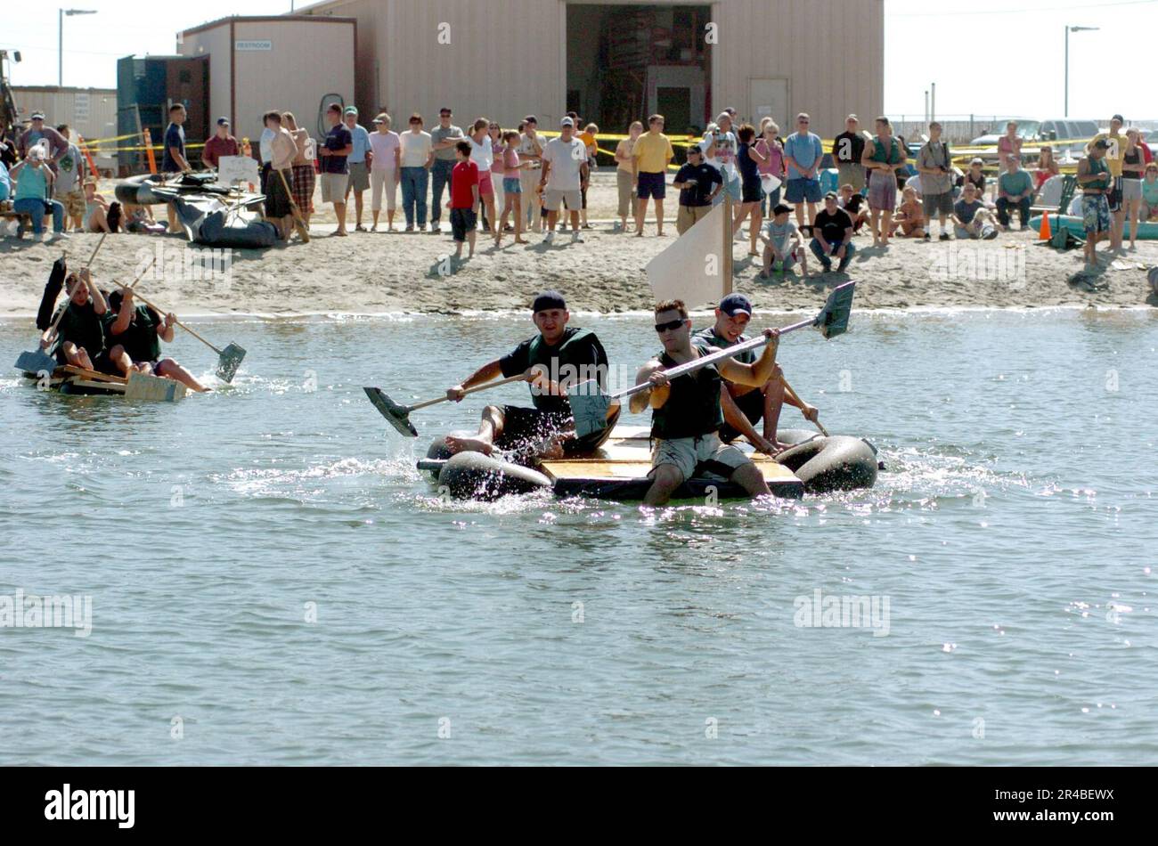 US Navy Teams participating in the Bayside Boat Bash race their vessels ...