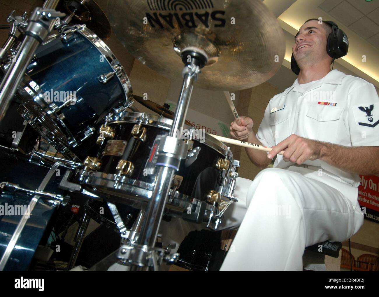 US Navy Musician 3rd Class assigned to the Pacific Fleet Rock Band on ...