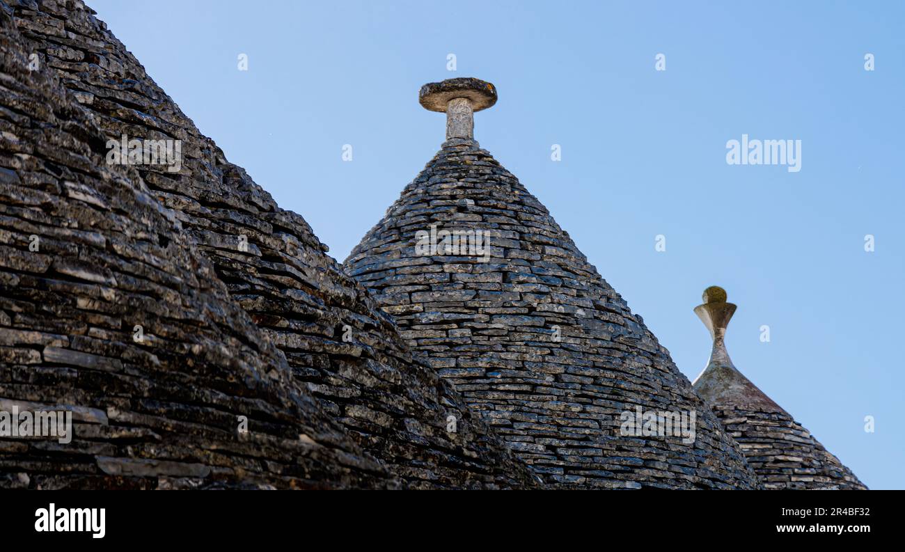 The trulli, typical limestone dwellings of Alberobello in southern ...