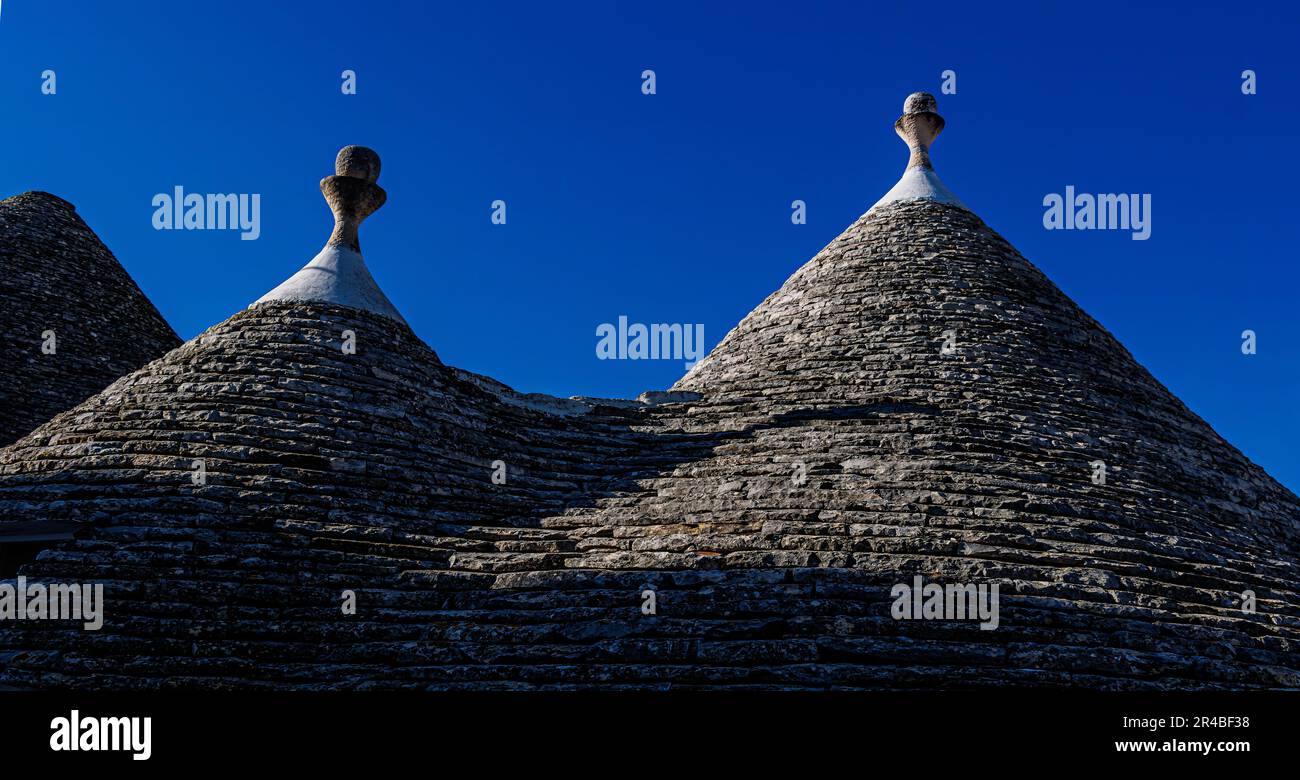 The trulli, typical limestone dwellings of Alberobello in southern ...