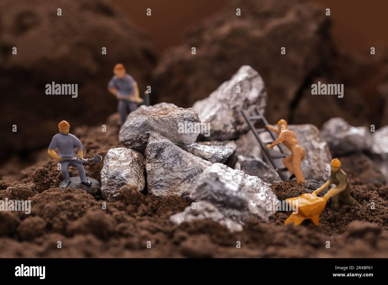 Mining of Cobalt. Renewable energy concept. Miniature worker mining ...