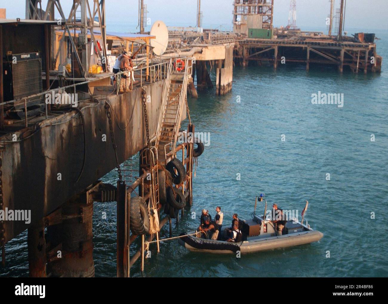 US Navy Sailors assigned to the guided missile crauiser USS Chosin (CG ...