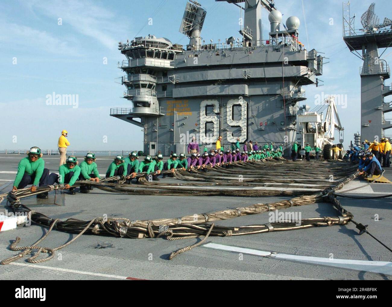 US Navy Air Department personnel assigned to the Nimitz-class aircraft ...