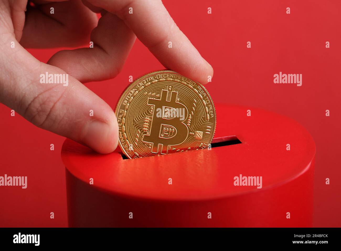 Gold coin donation hi-res stock photography and images - Alamy