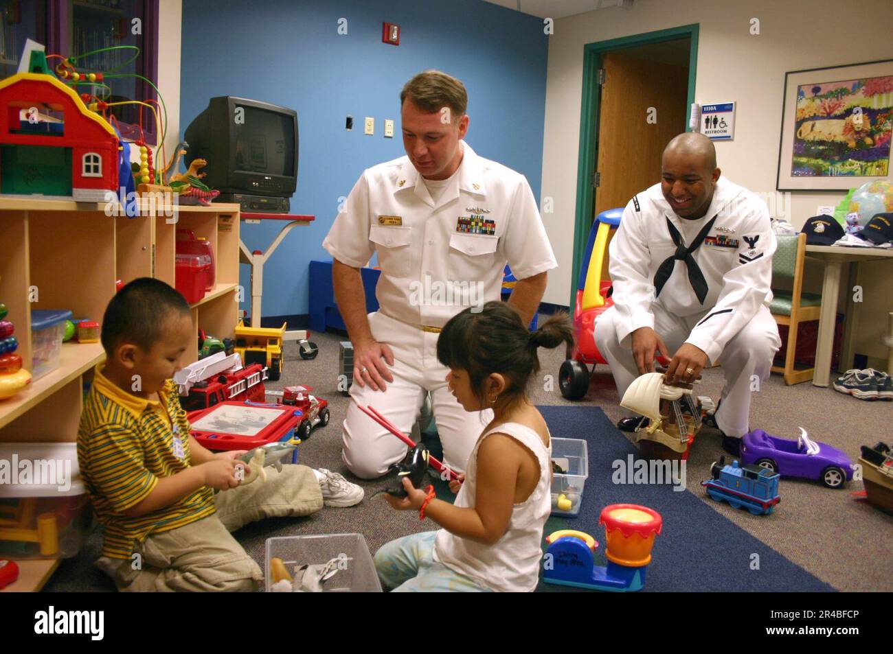 US Navy Senior Chief Electronics Technician (left) and Electronics ...