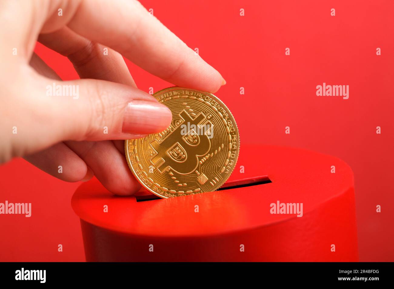 Gold coin donation hi-res stock photography and images - Alamy