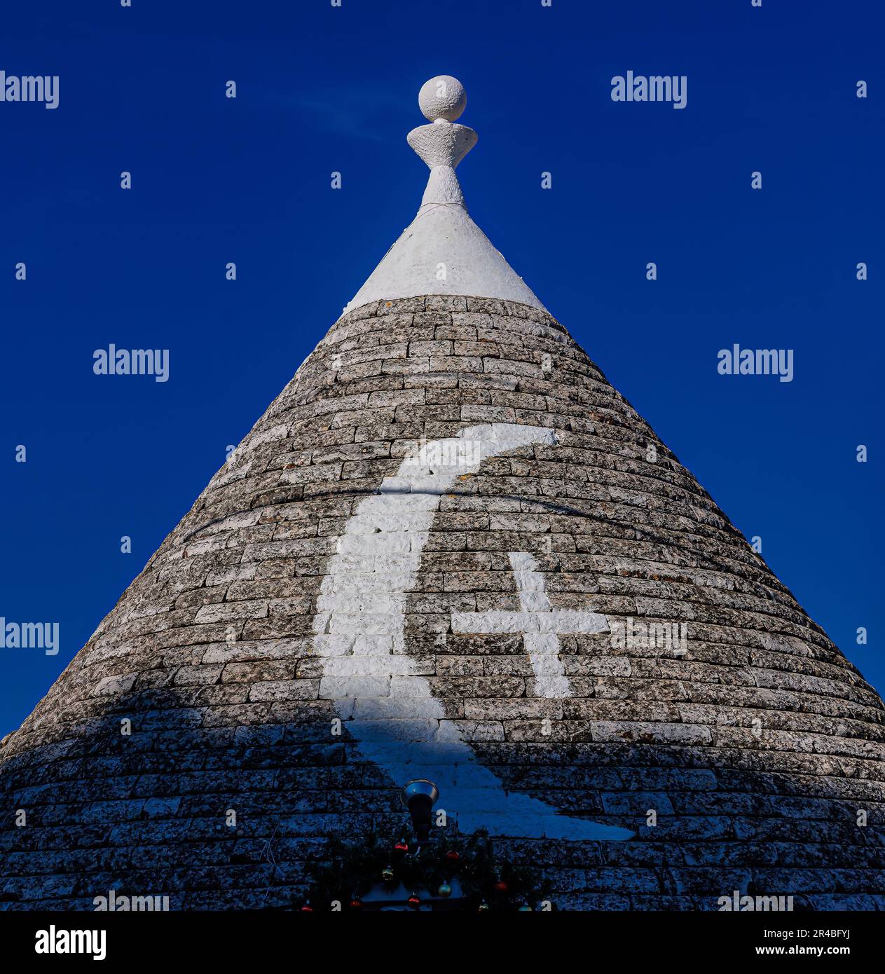 The trulli, typical limestone dwellings of Alberobello in southern ...