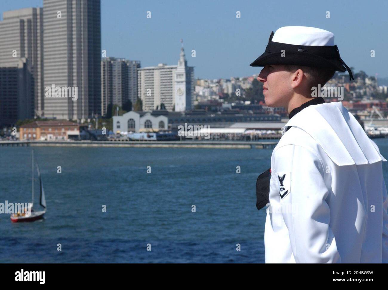 US Navy Aviation Boatswain's Mate Handling 3rd Class mans the rails ...