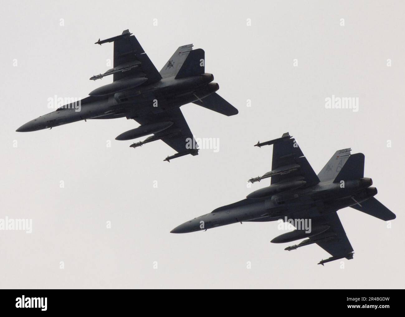US Navy Two F-A-18C Hornets, assigned to the Bulls of Strike Fighter ...