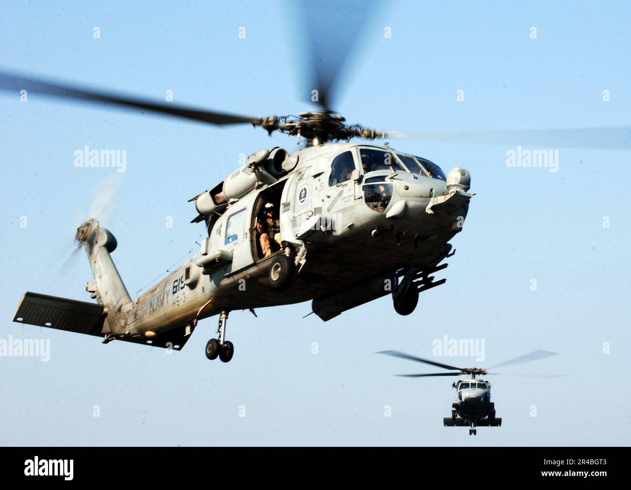 US Navy An HH-60H Seahawk and an SH-60F Seahawk, both assigned to the Tridents of Helicopter ...