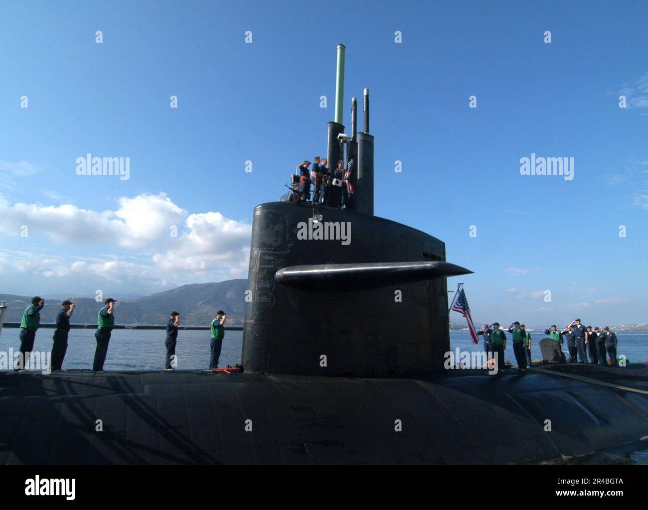 US Navy Crew members aboard the Los Angeles-class fast attack submarine ...