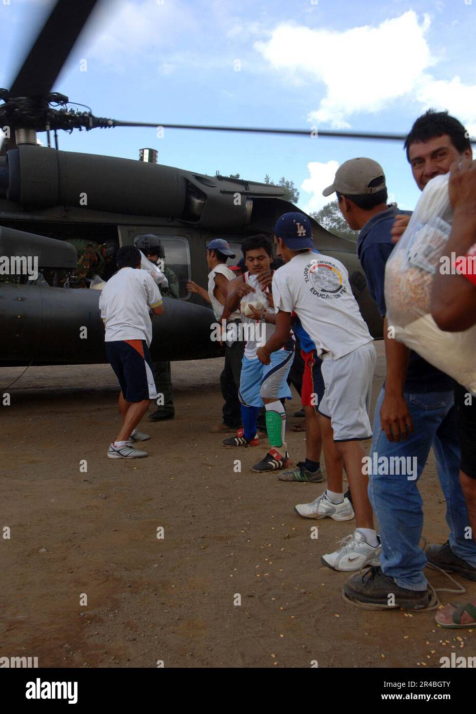 US Navy Victims of Hurricane Stan in Guatemala form long lines helping ...