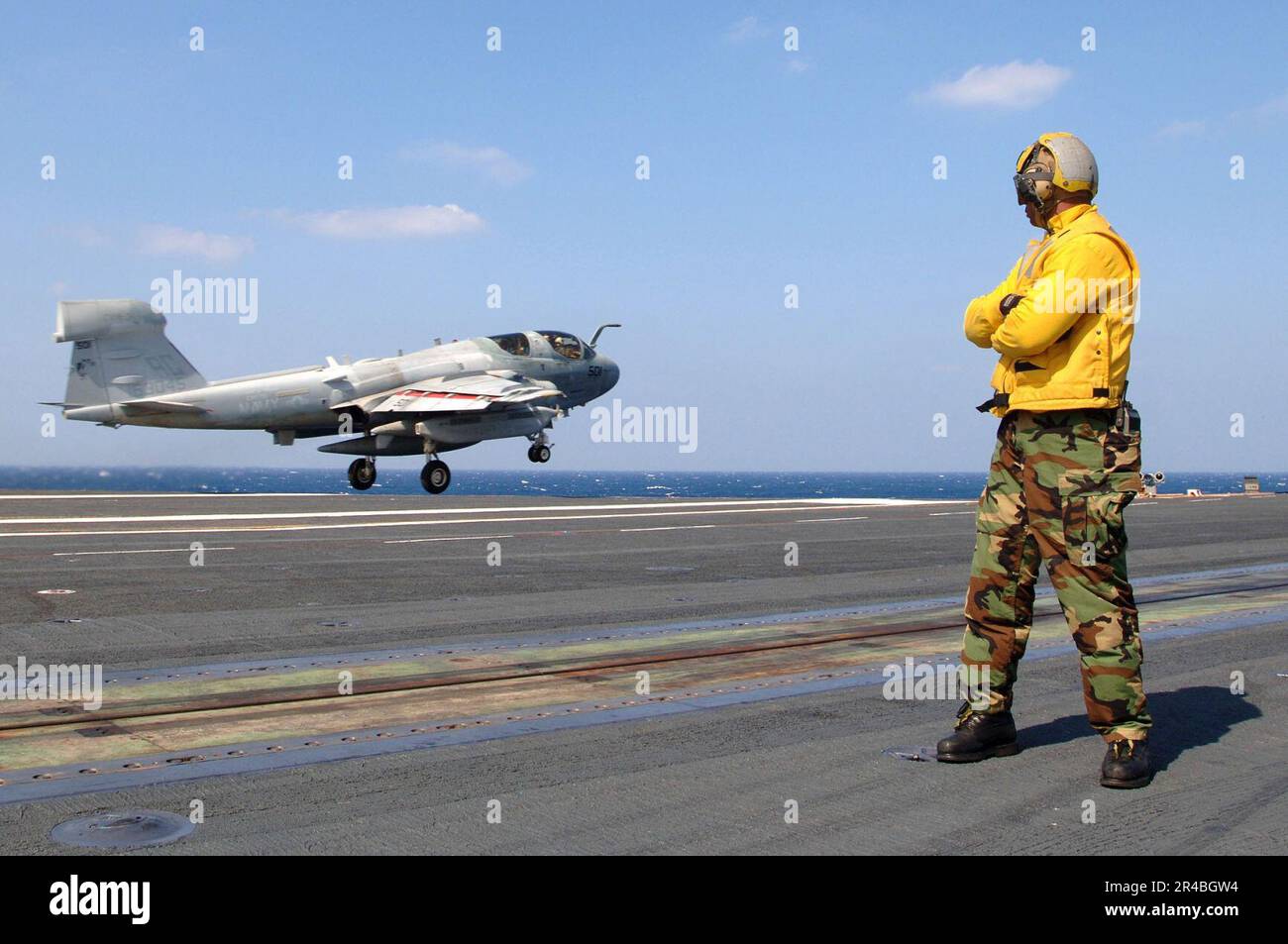 US Navy An Aviation Boatswain's Mate watches as an EA-6B Prowler ...