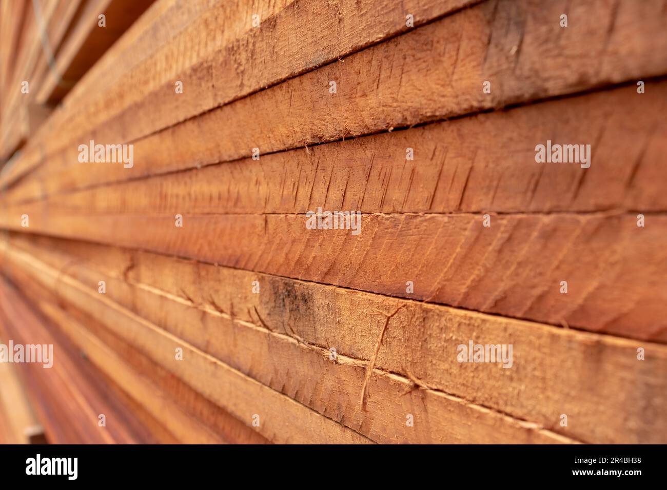 Closeup on a stack of lumber planks Stock Photo - Alamy