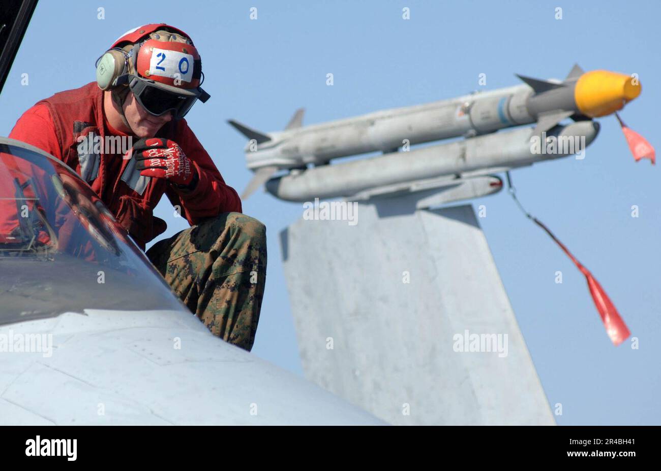 US Navy An Aviation Ordnanceman assigned to the Silver Eagles of Marine ...