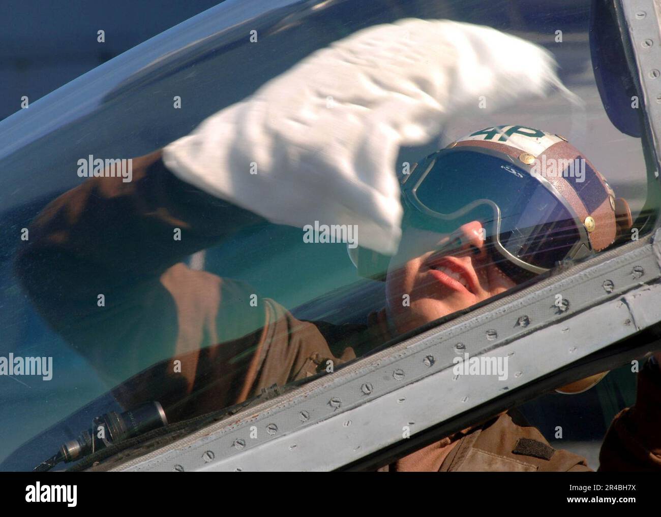 US Navy A plane captain assigned to the Gunslingers of Strike Fighter ...