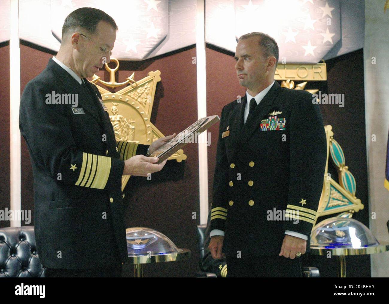 US Navy Chief of Naval Operations (CNO) Adm. Mike Mullen presents a ...